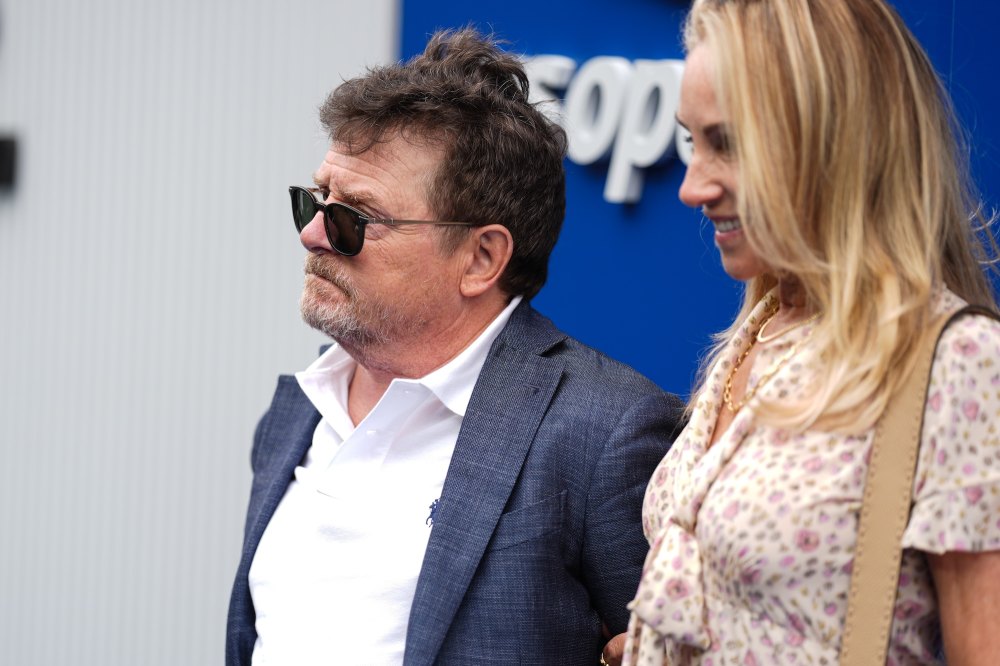 Michael J. Fox, Tracy Pollan at US Open; Stands from Wheelchair with ...